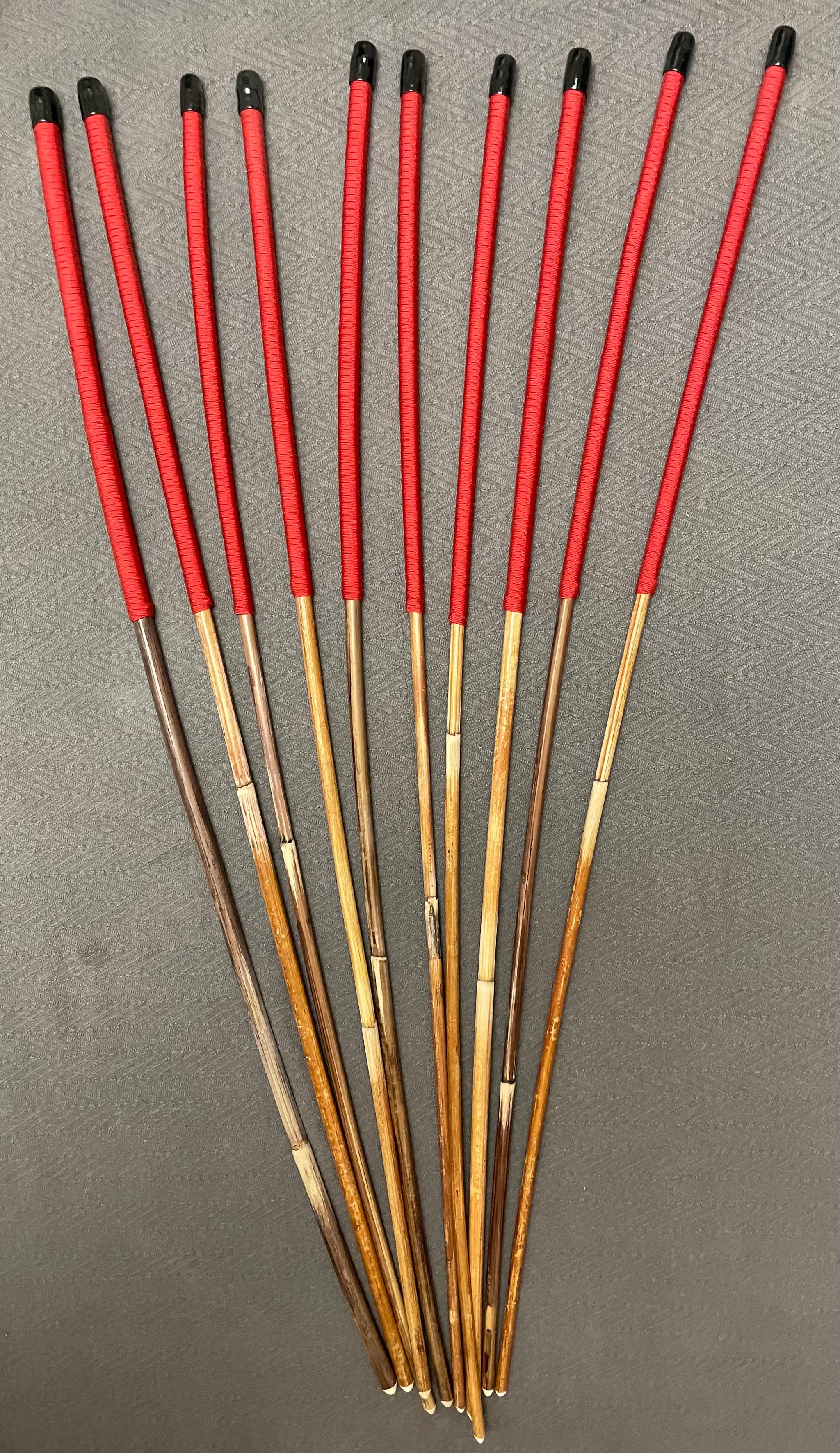 Set of 10 Dragon Canes 95 cms Red Handles - Sales Special