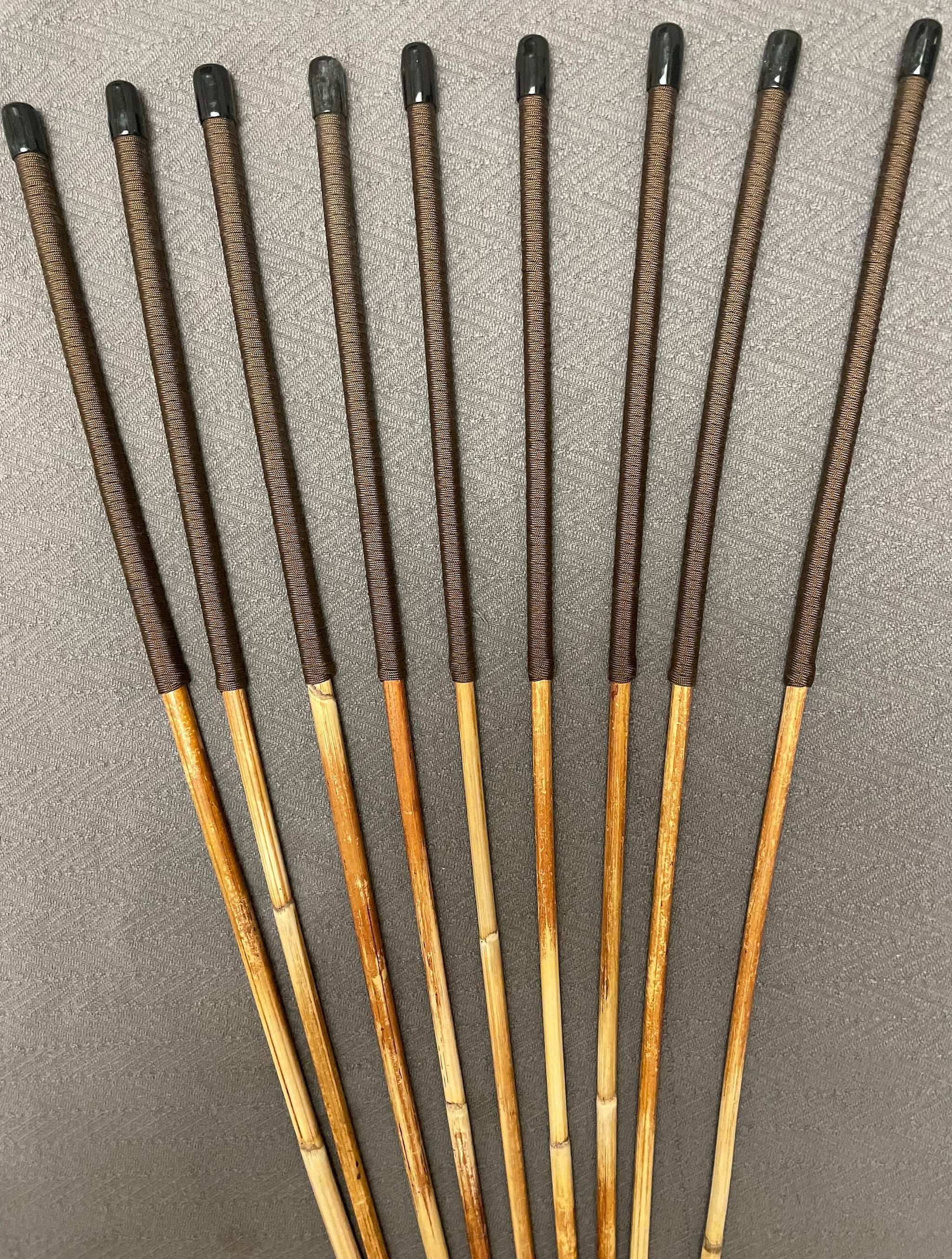 Set of 9 Dragon Rattan Canes 95 cms Brown Hdls Sales Special